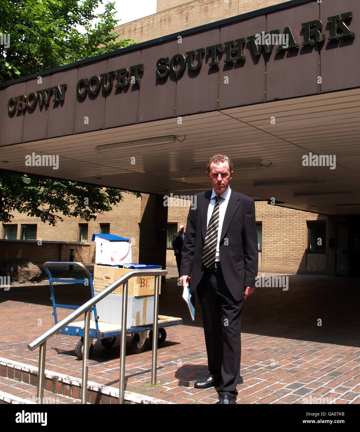 Detective Constable Ian Haywood makes a statement outside the Southwark ...