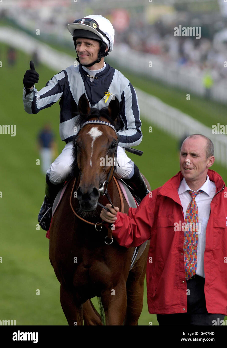 Jockey Ted Durcan celebrates on Light Shift after winning the Vodafone ...