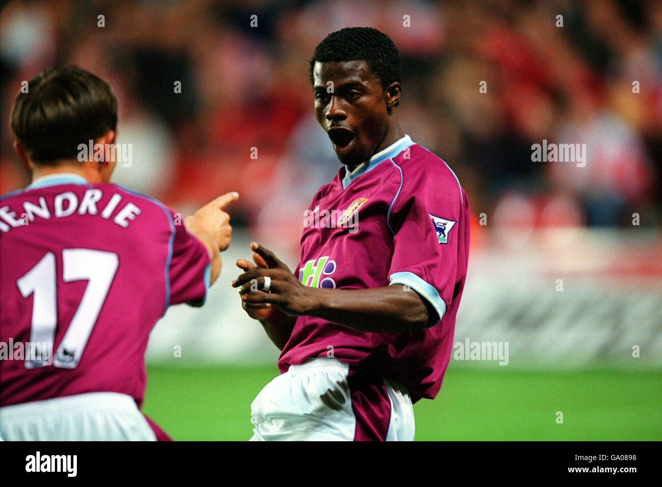 Aston Villa's George Boateng (r) celebrates scoring the opening goal ...