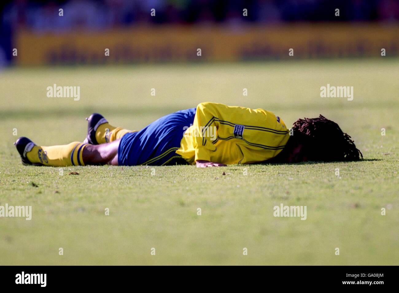 St Johnstone's Benito Kemble lies injured on the turf Stock Photo - Alamy