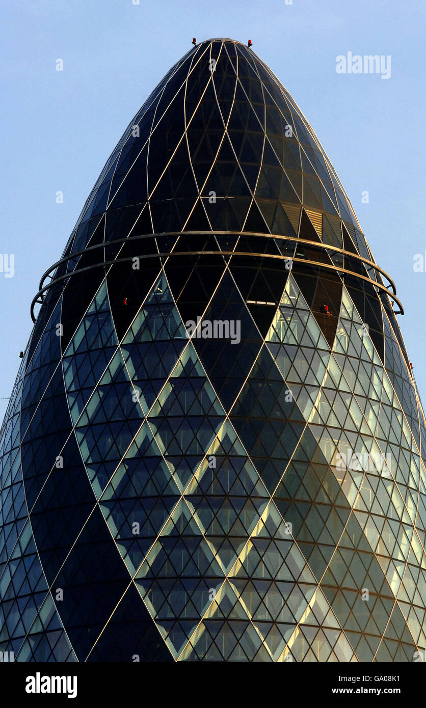 View of the Gherkin building, at twilight, as seen from Bishopsgate in ...