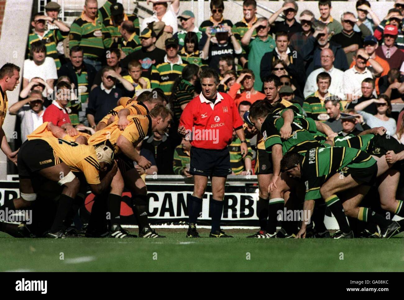 Referee Chris White brings the two packs together for a scrum Stock ...