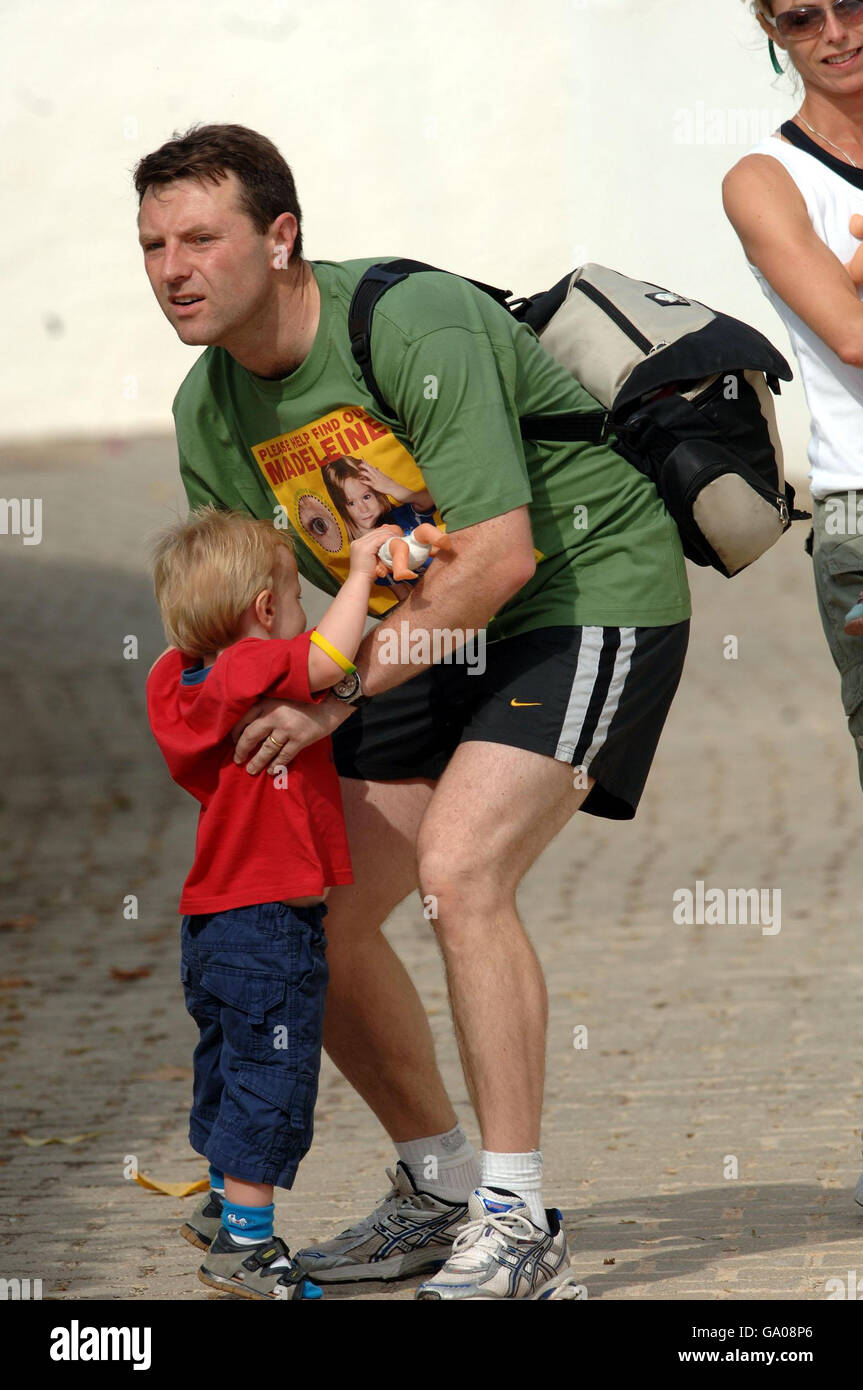 Gerry McCann with son Sean on their way to the creche in Praia Da Luz ...