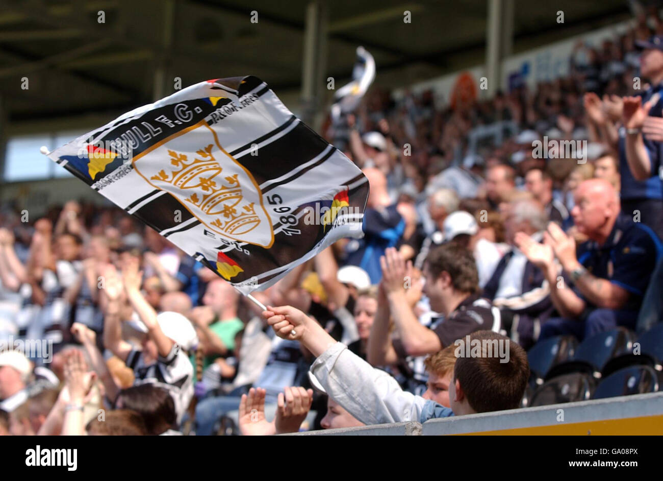 A Hull FC fan waves a flag during the engage Super League match between ...