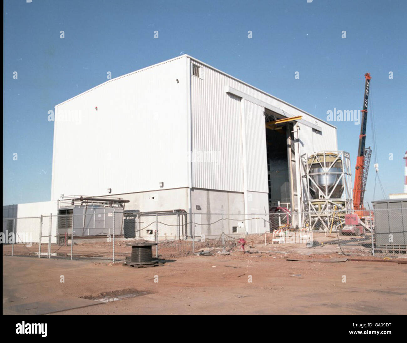 An image of the Atlas missile being carefully checked by engineers ...