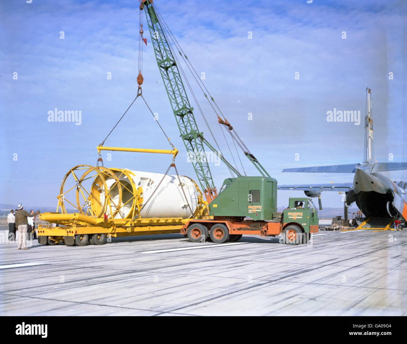 An Atlas missile preparing for launch, with detailed views of the ...