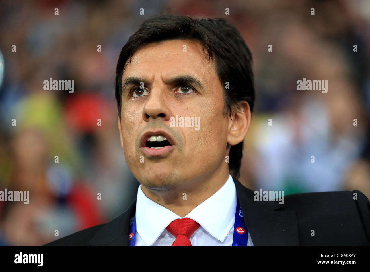 Wales manager Chris Coleman sings the national anthem during the UEFA ...