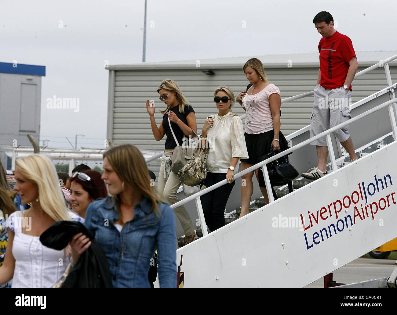 Soccer - UEFA Champions League - Liverpool Players return to John ...