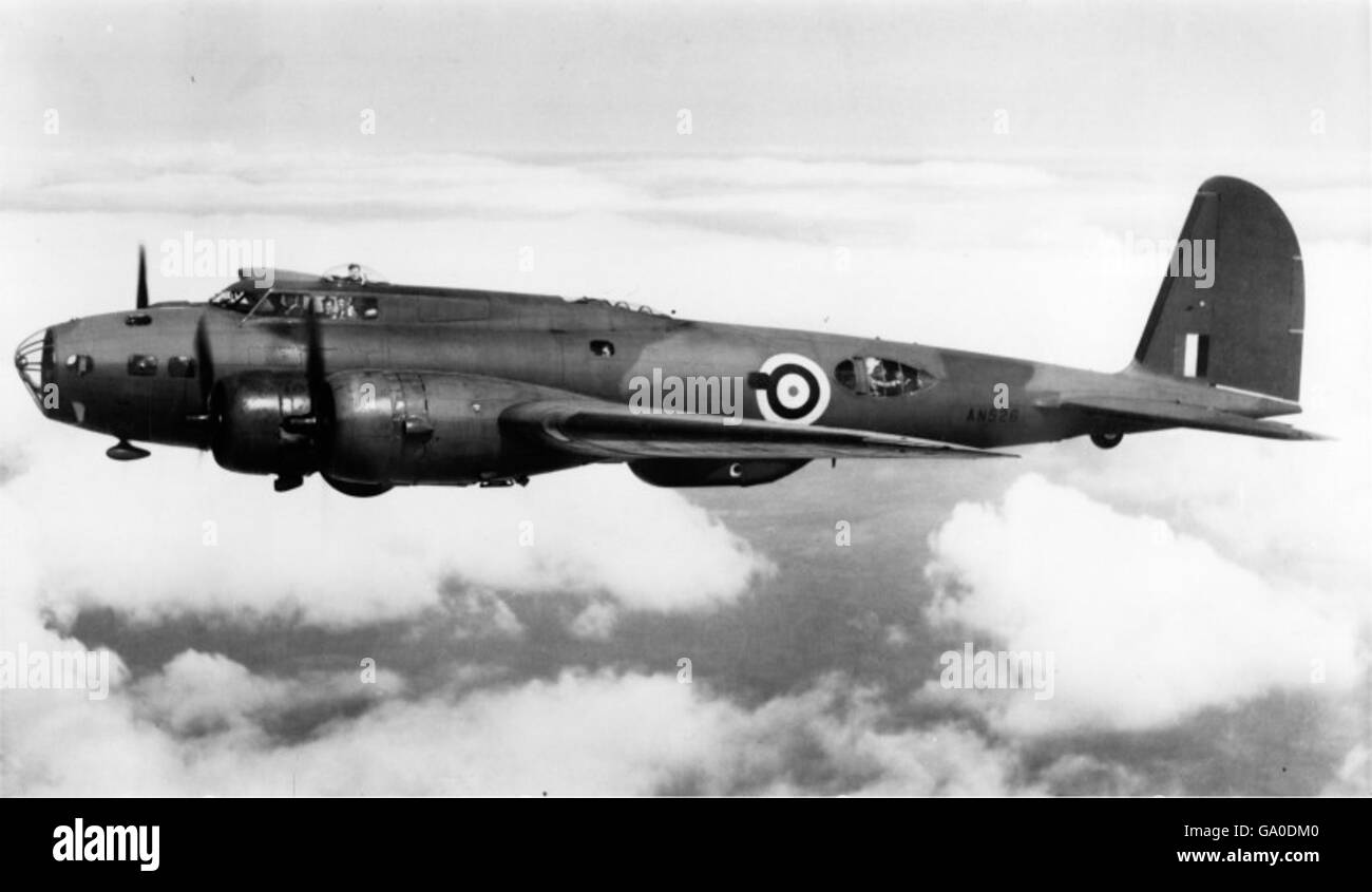 A Curtiss P-40 Warhawk in flight during World War II. The P-40, used ...