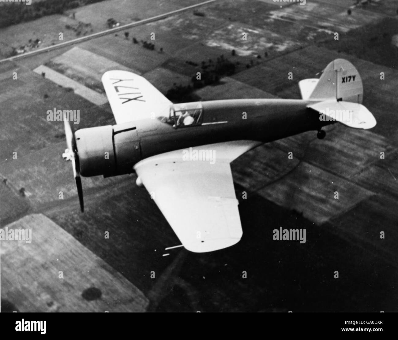 A U.S. military aircraft from the 1950s, captured mid-flight ...