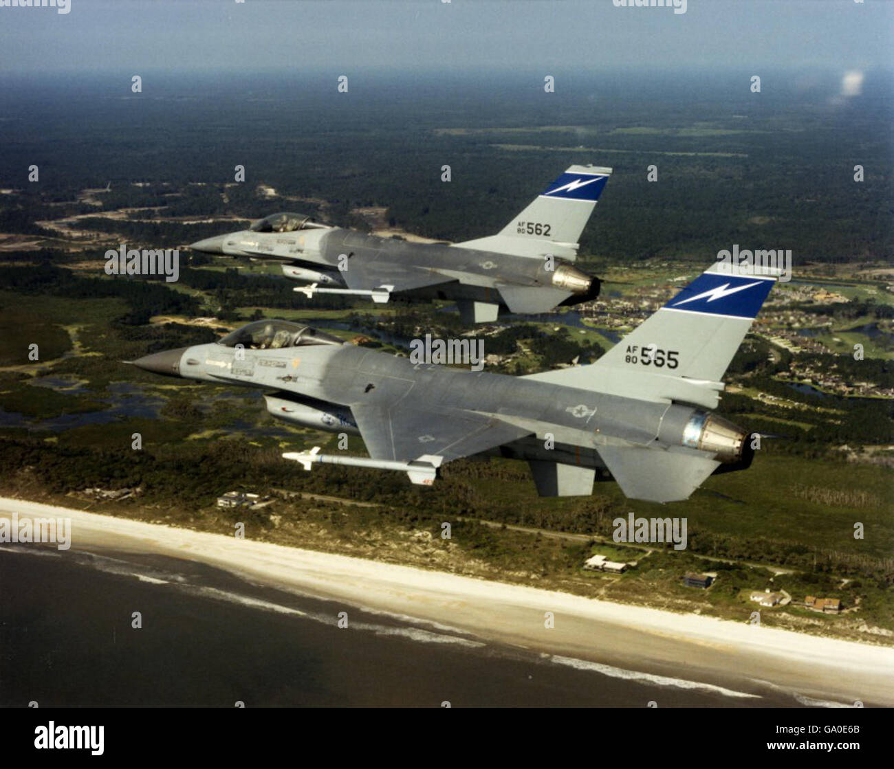 A historic photograph of a P-47 Thunderbolt in flight. The P-47 was one ...