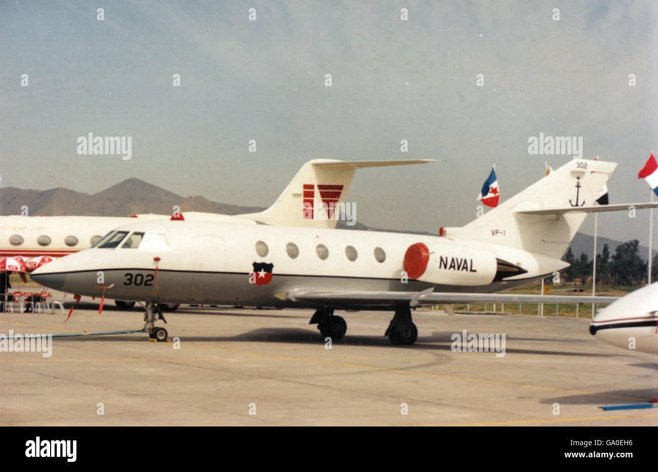 This photograph from the Rene Francillon Collection features a classic ...