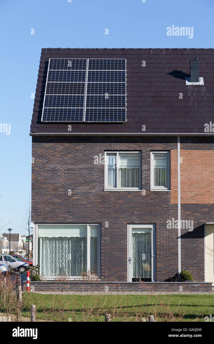 Family homes with solar panels Stock Photo - Alamy