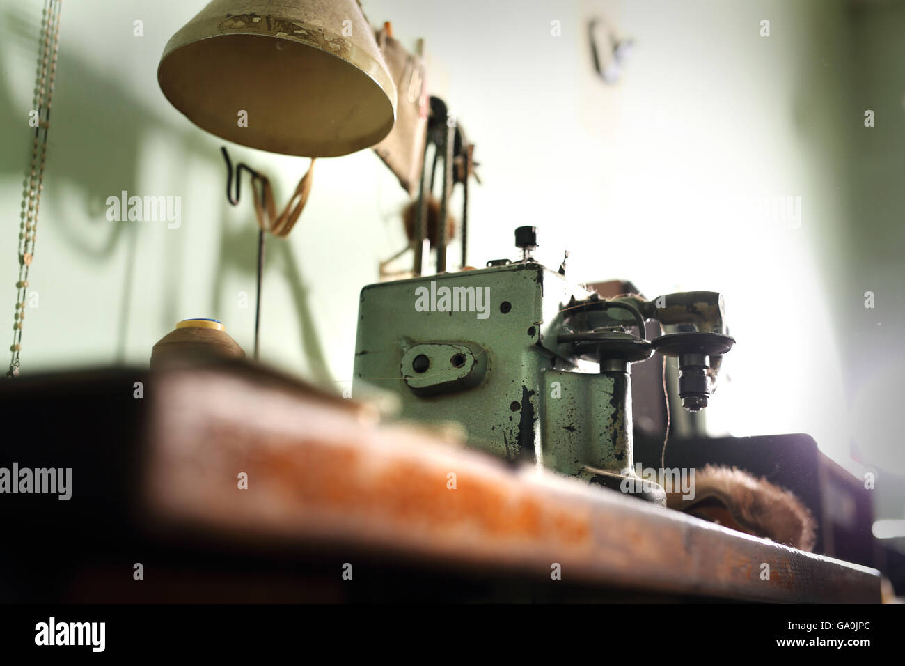 Sewing machine in a tailor shop Stock Photo - Alamy