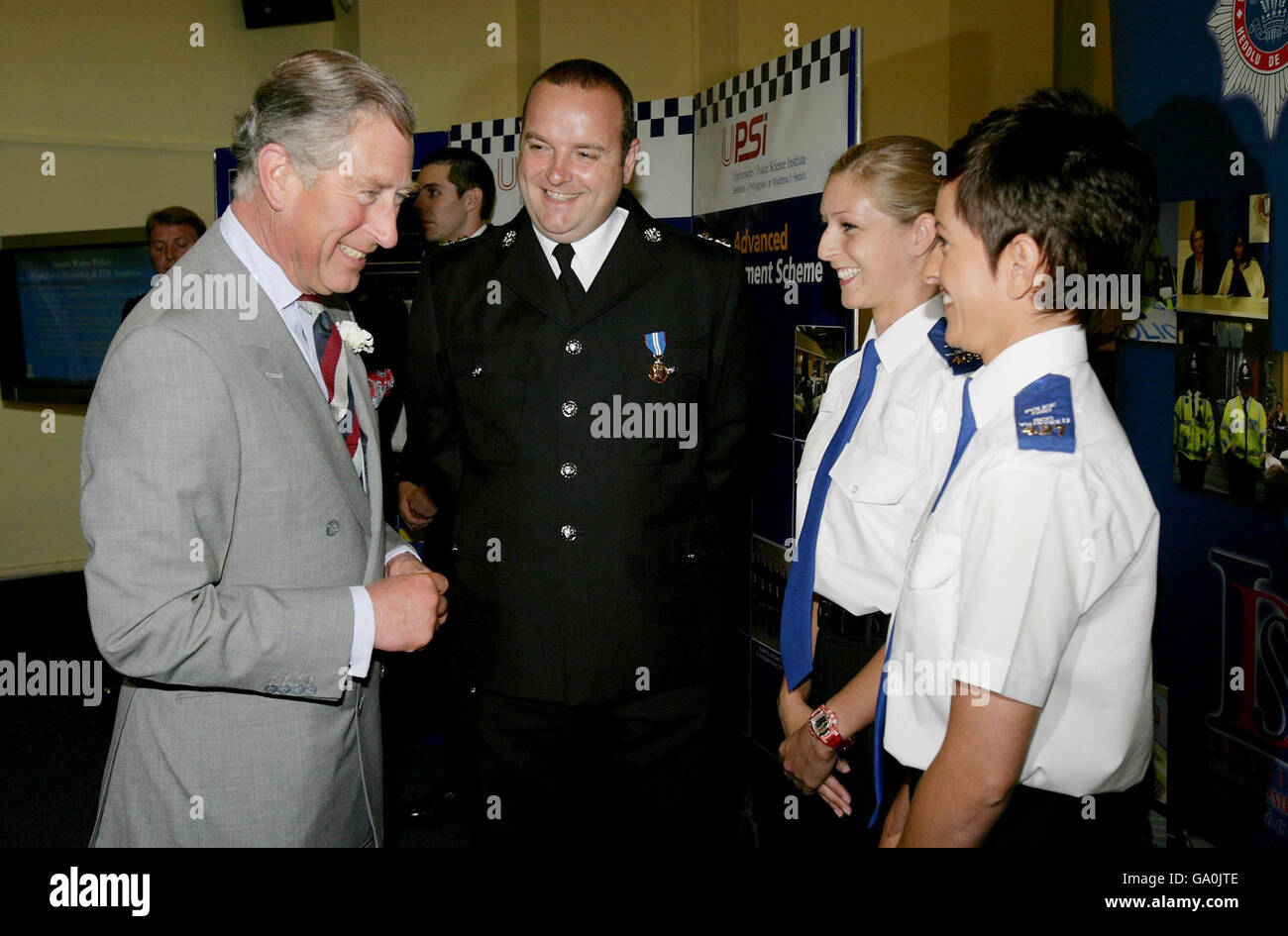 The Prince of Wales shares a laugh with Inspector Peter Rees and ...