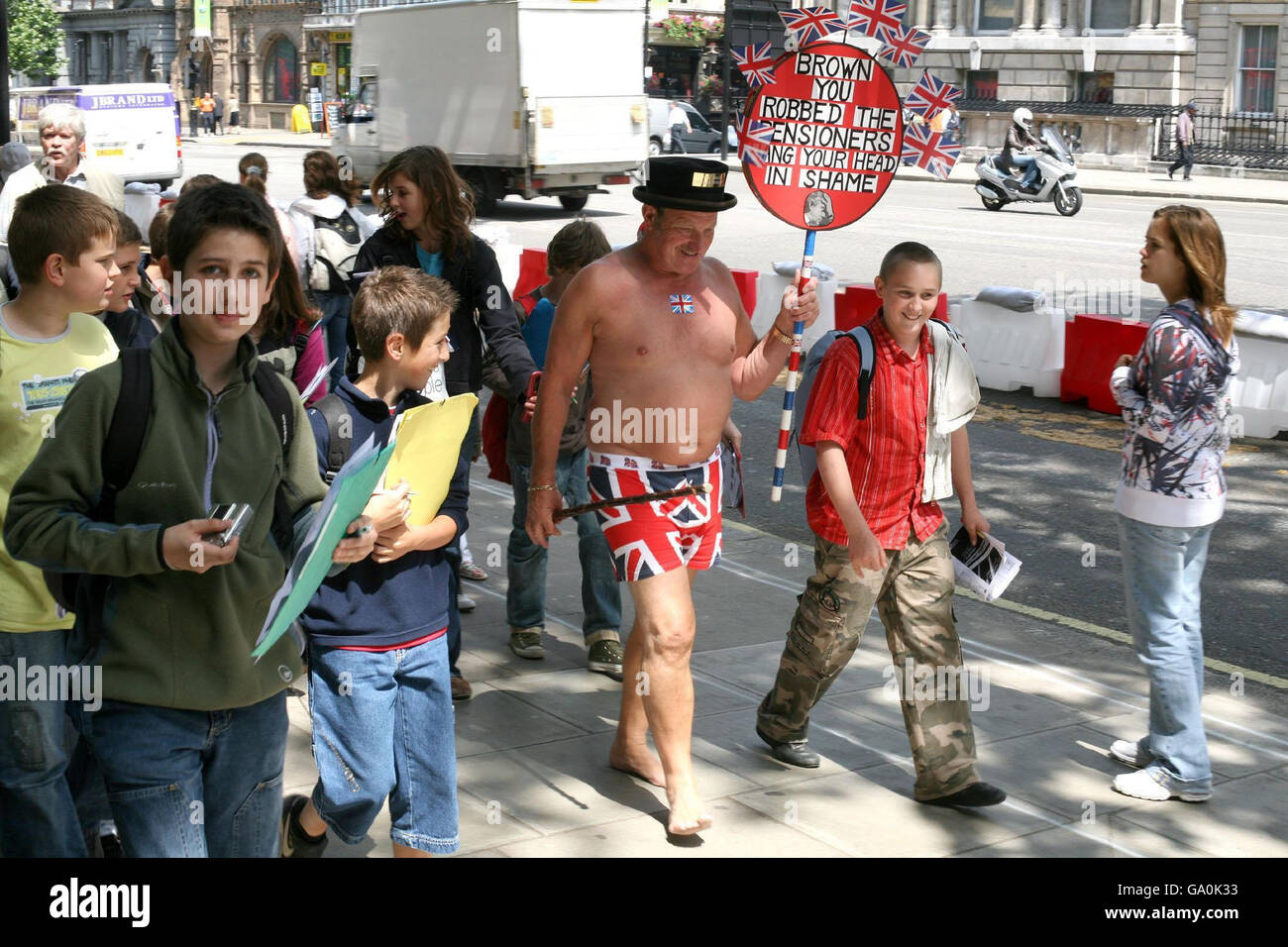 Ray Egan of the Pensions Action Group joins a 'strip off' outside ...