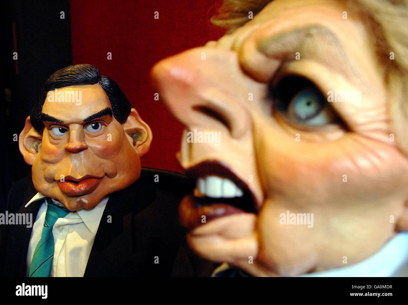 Puppets of Chancellor of the Exchequer Gordon Brown (left) and former ...