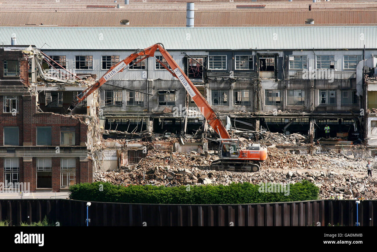 A general view of an Erith Group crane at work demolishing an old ...