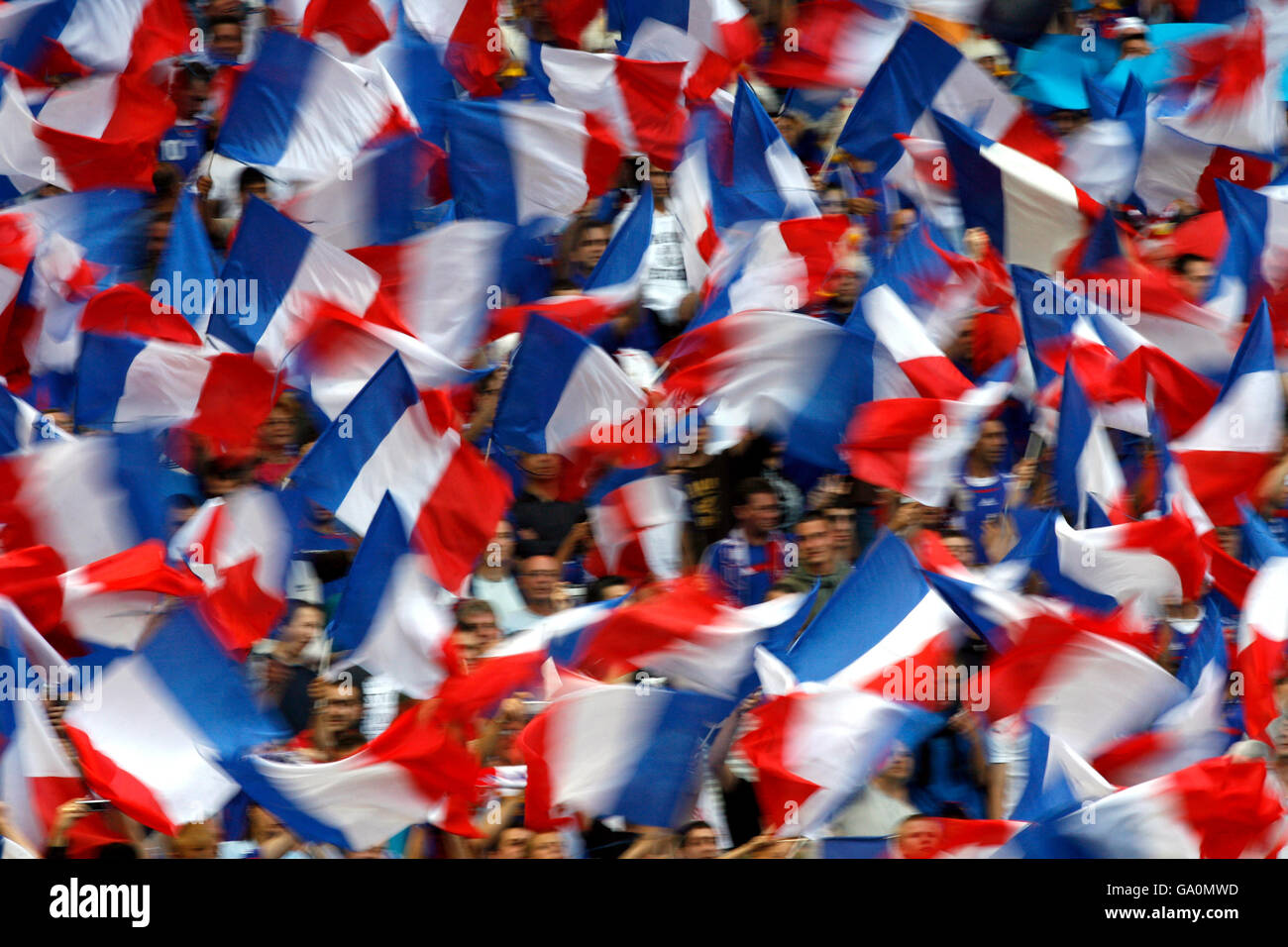 France fans waving their tricolour flags prior to the game Stock Photo ...