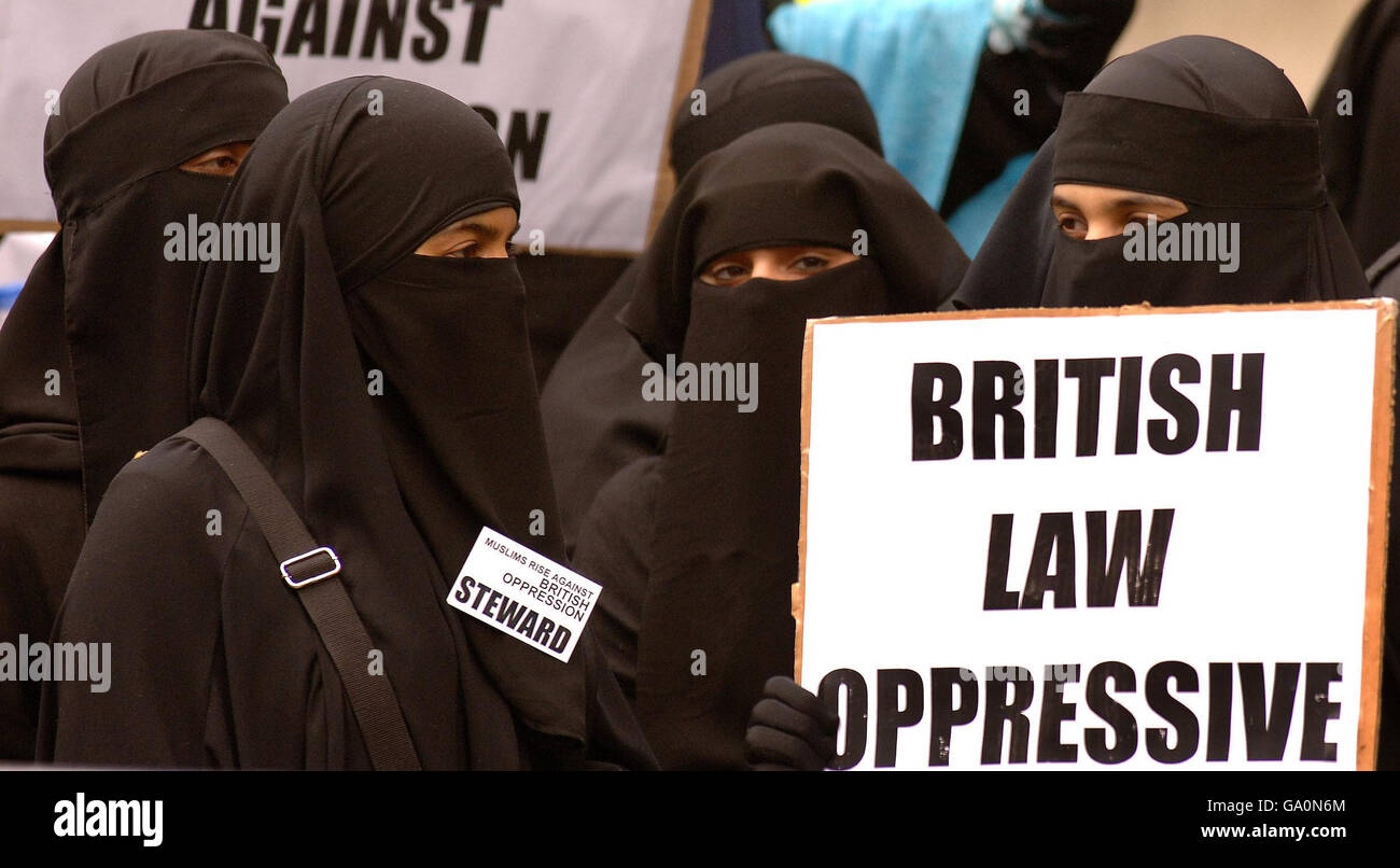 A large group of muslims demonstrate against the British government ...