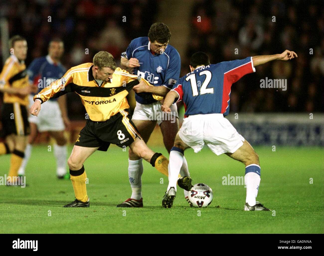 Livingston's Steven Tosh tries to get the ball past Rangers' Shota ...