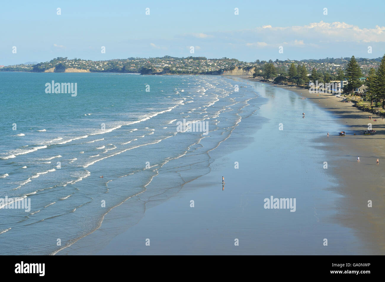 Flat sandy beach with surf waves Stock Photo - Alamy