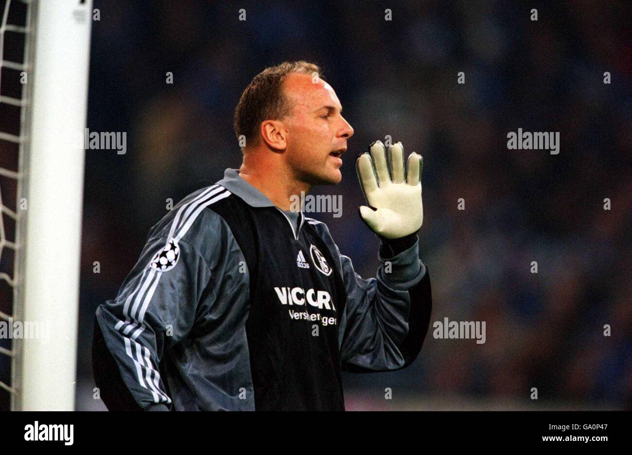 Schalke's goalkeeper and captain Oliver Reck directs his team Stock ...