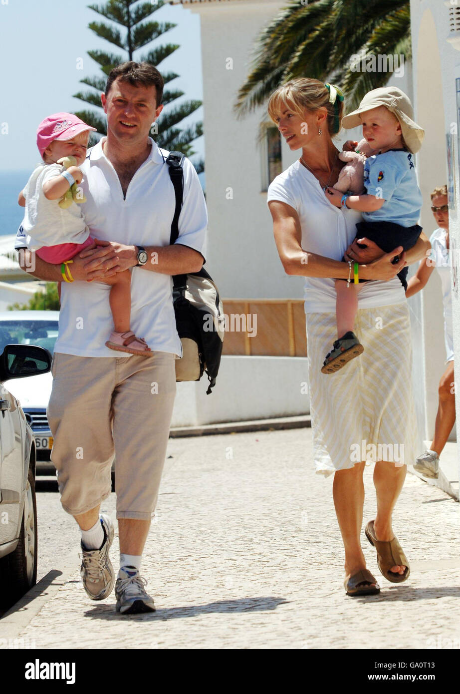 Kate and Gerry McCann collect children Sean and Amelie (left) from the ...