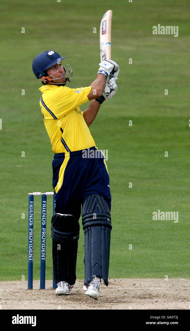 Yorkshire's Michael Vaughan looks up after hitting a ball up in the air ...