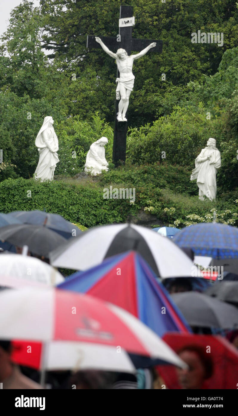Gather in heavy rain for mass at mount argus church hi-res stock ...