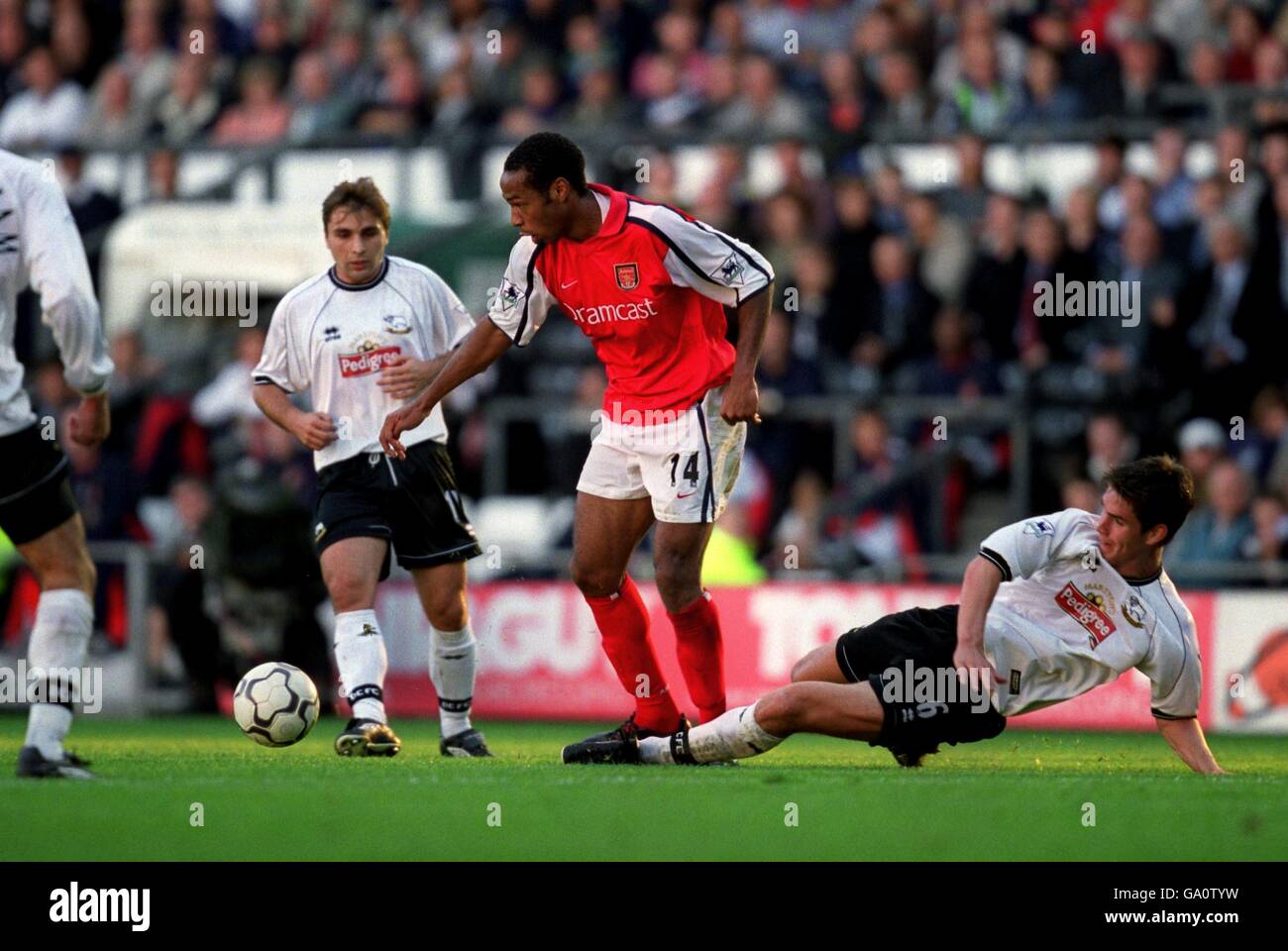 Derby countys chris riggott tackles arsenals thierry henry hi-res stock ...