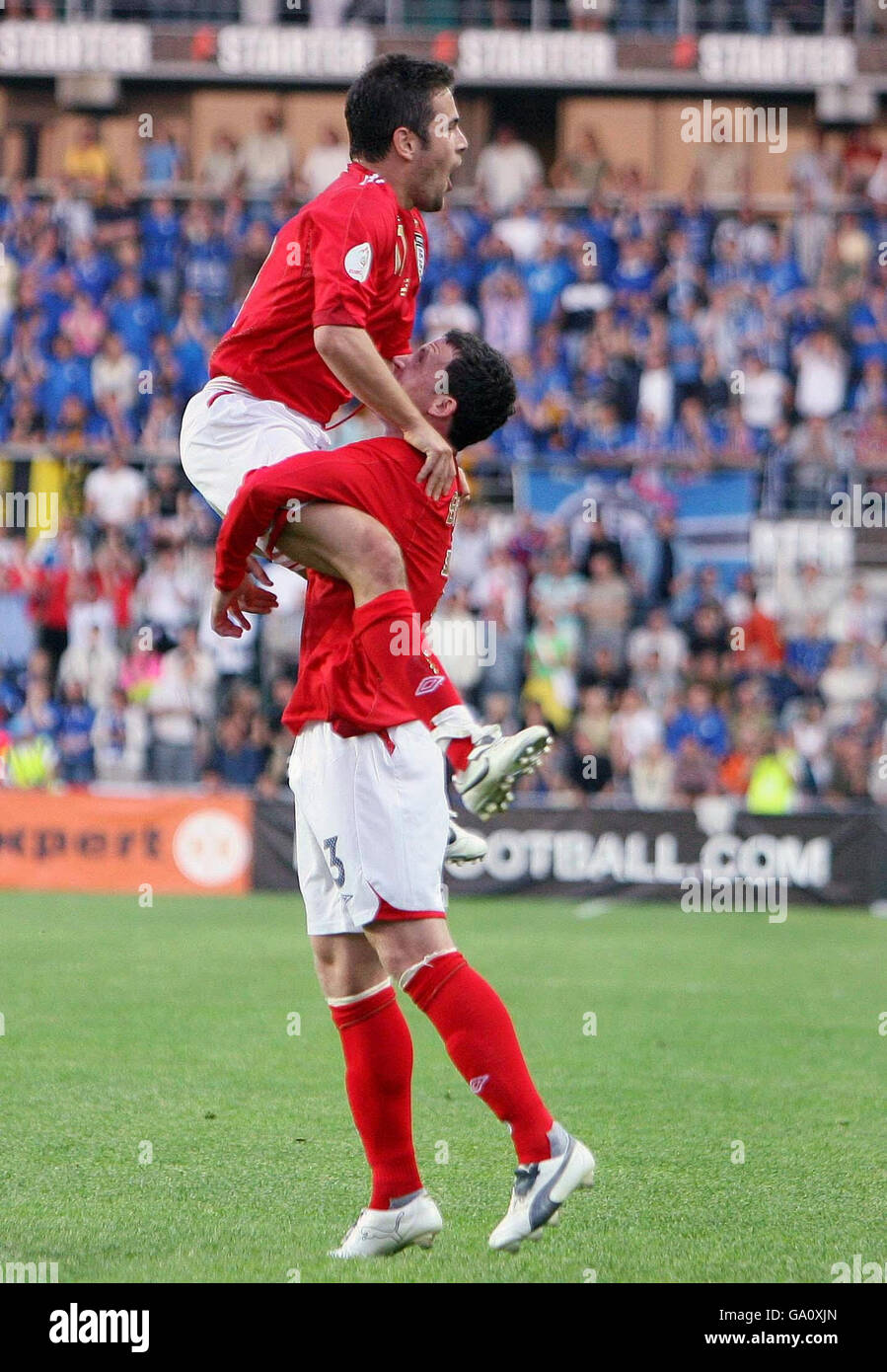 England's Joe Cole celebrates scoring against Estonia with Wayne Bridge ...