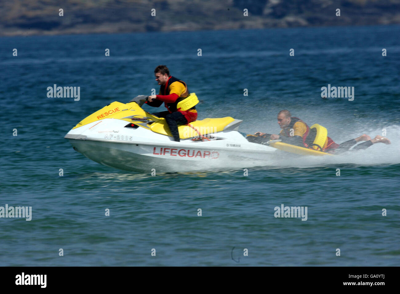 Lifeguards during a practice rescue session at Portrush East Strand in ...