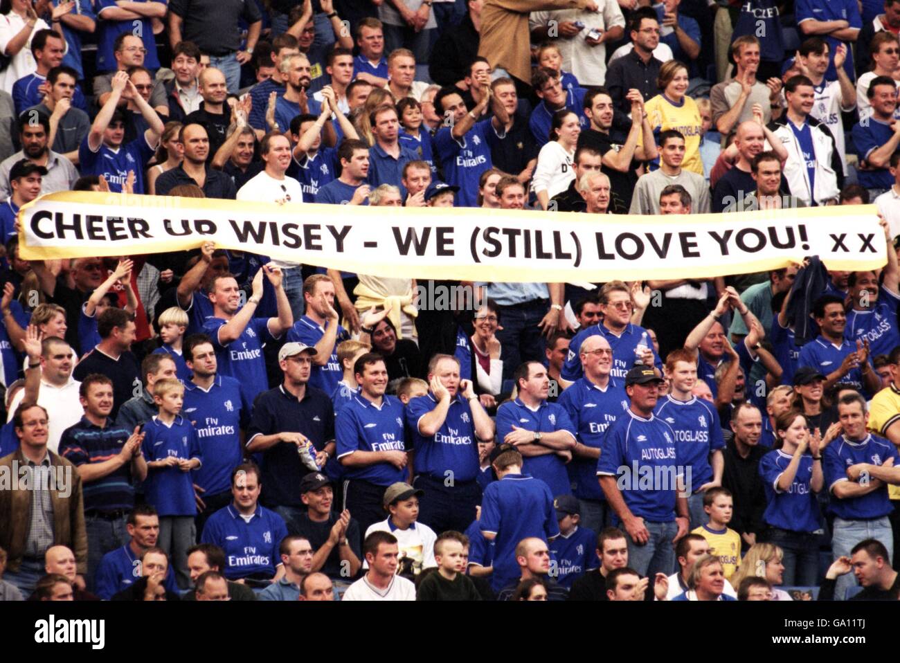 Chelsea fans hold up a banner with a message for their former player ...