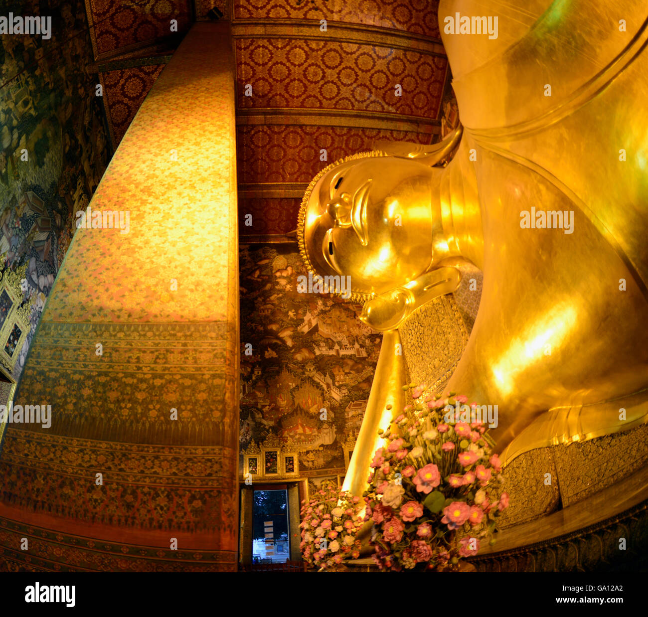 the reclining buddha in the temple of Wat Pho in the city of Bangkok in Thailand in ...