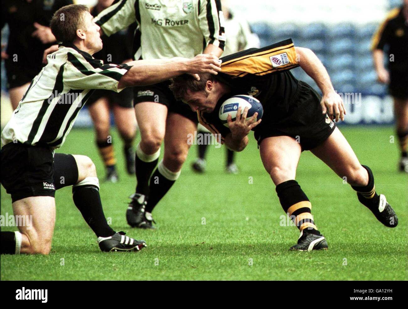 London wasps paul sampson is pulled to the ground hi-res stock ...