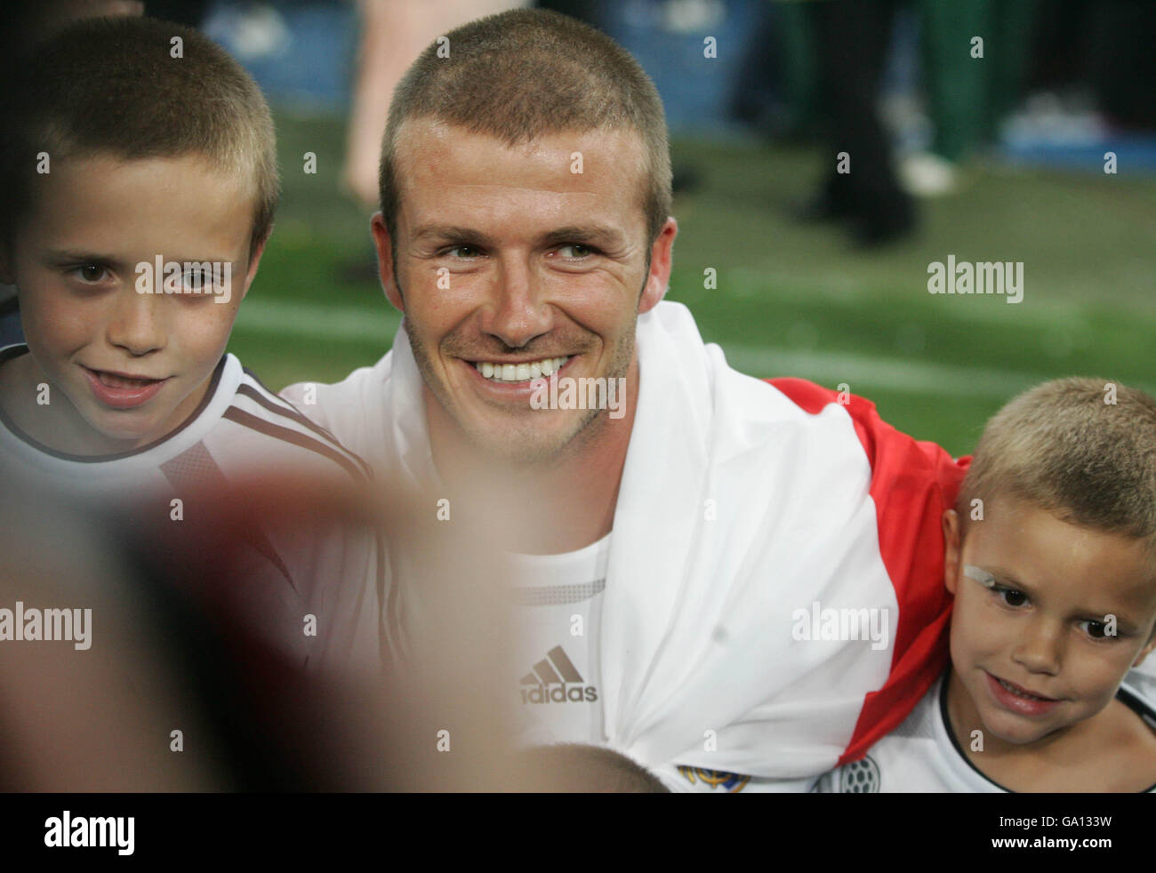 Real Madrid's David Beckham with kids Brooklyn and Romeo Stock Photo ...
