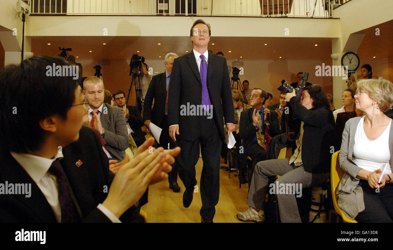 Conservative Party leader David Cameron addresses party members, in ...