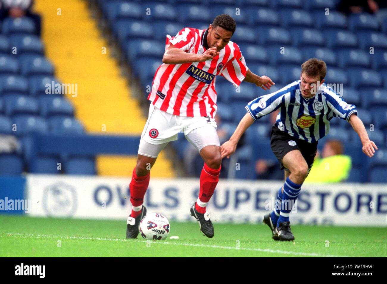 Sheffield uniteds carl asaba takes on sheffield wednesdays ashley ...