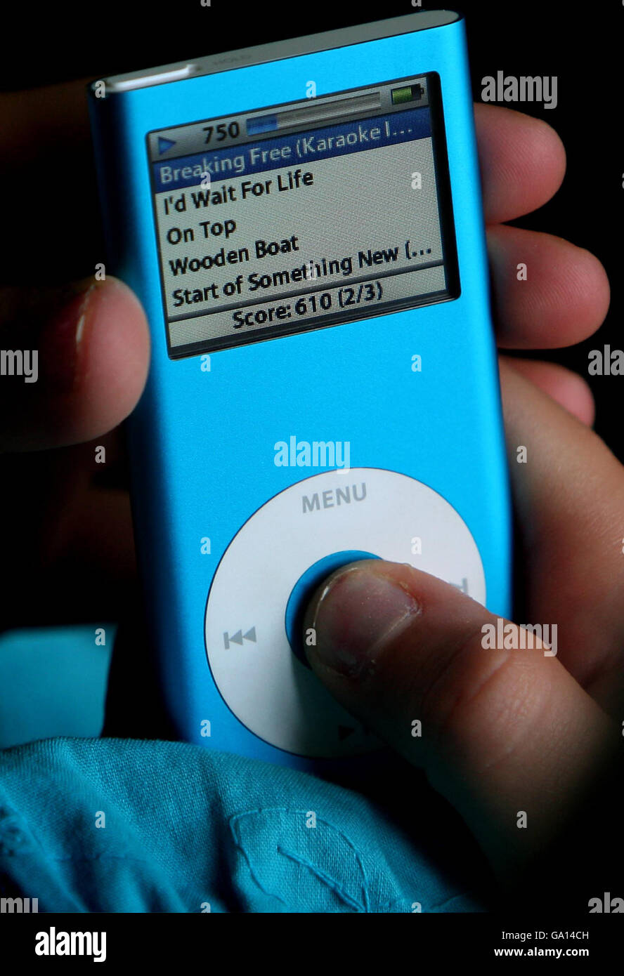 Generic stock picture of a young girl using an Apple iPod Stock Photo ...