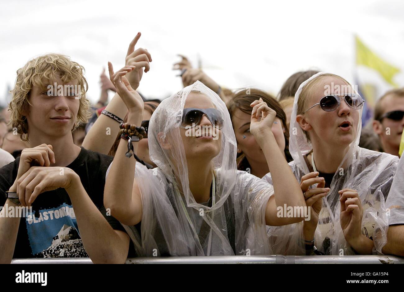 Festival Goers In The Crowd At The 2007 Glastonbury Festival At Worthy