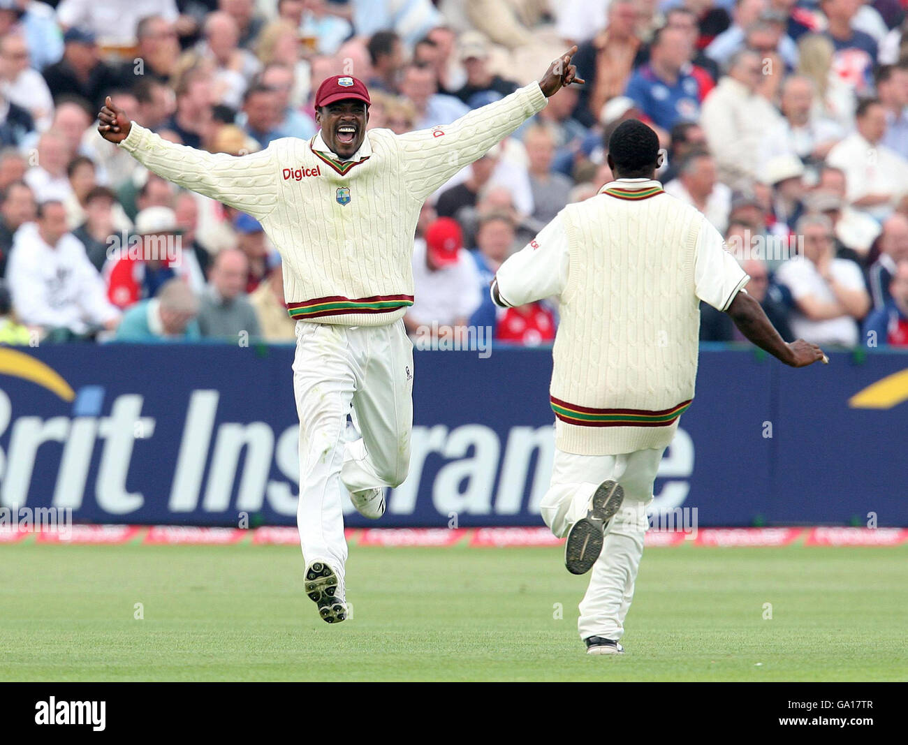 West Indies' Runako Morton (left) celebrates catching England's Matt ...
