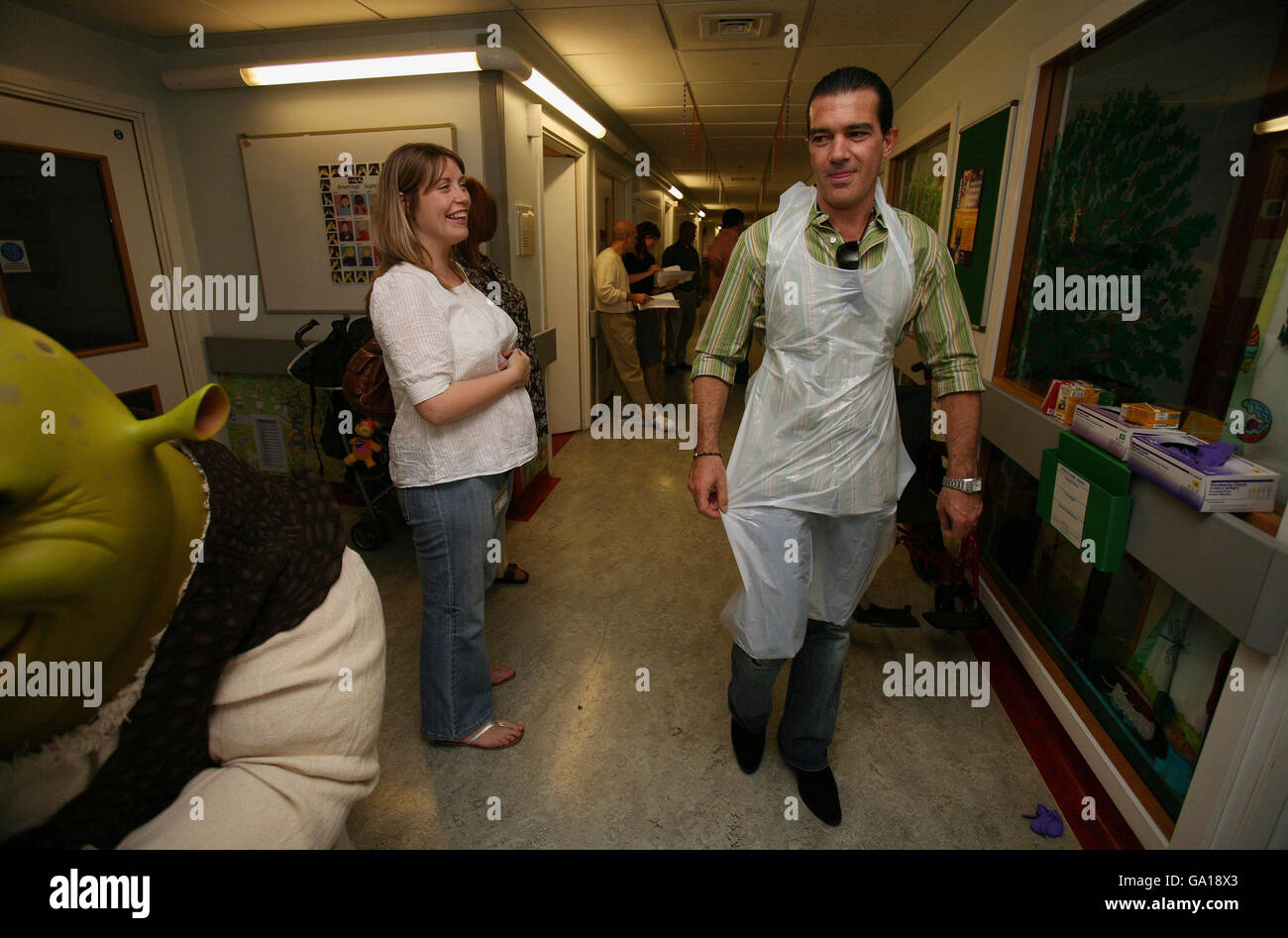 Shrek the Third star Antonio Banderas walks down a corridor during a ...