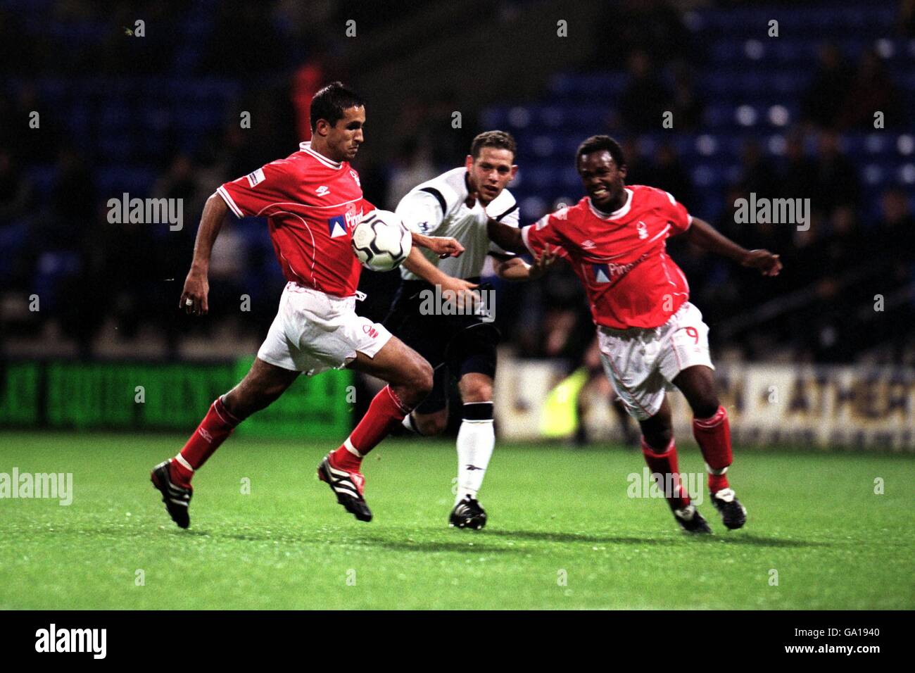 Nottingham Forest's Jack Lester drives forward as David Johnson holds ...