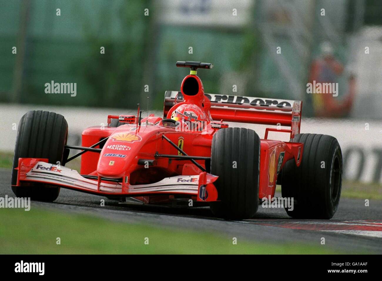 Michael schumacher exits the chicane at suzuka during practice hi-res ...