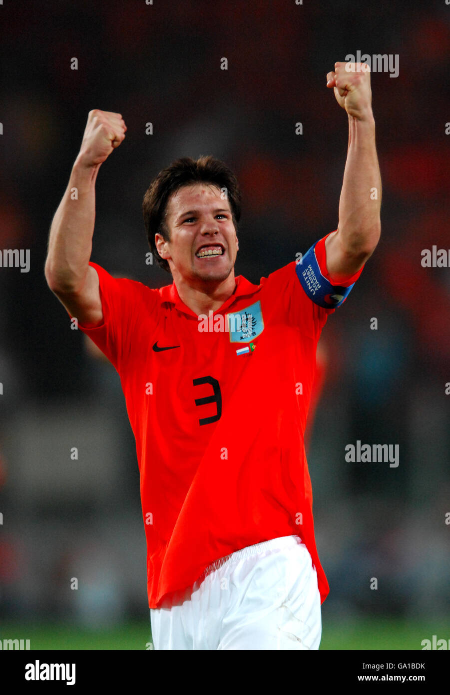 Holland's captain Ron Vlaar celebrates their victory at the final ...
