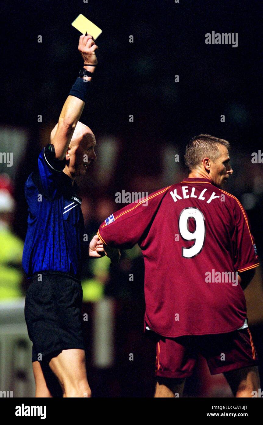 (L-R) Referee John Rowbotham cautions Motherwell's David Kelly Stock ...