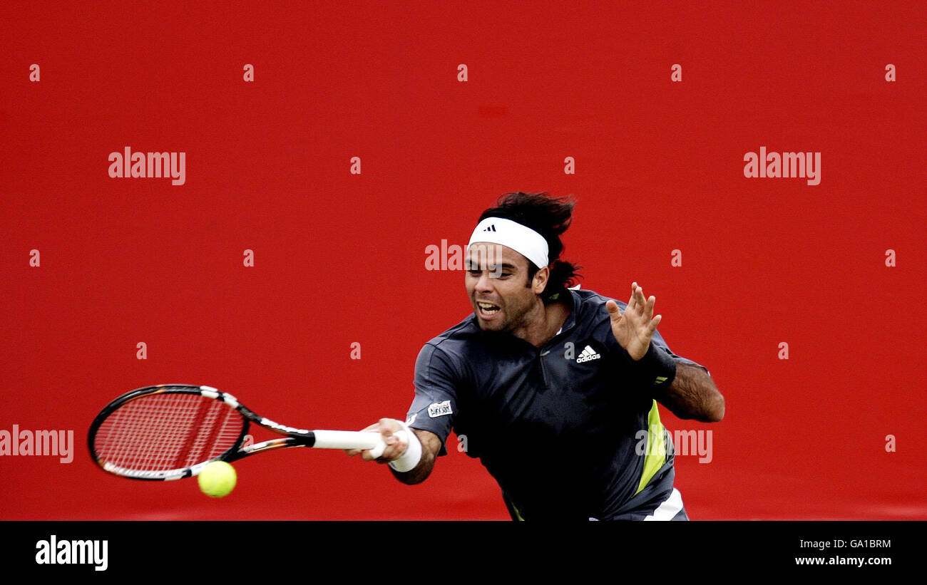 Chile's Fernando Gonzalez plays against USA's Robby Ginepri during the ...
