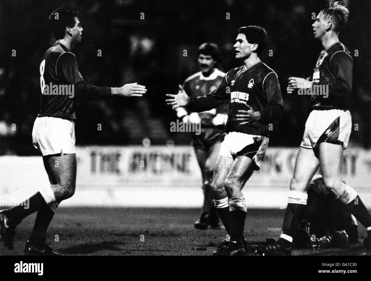 Forest's Nigel Clough (centre) celerbrates scoring the first goal of ...
