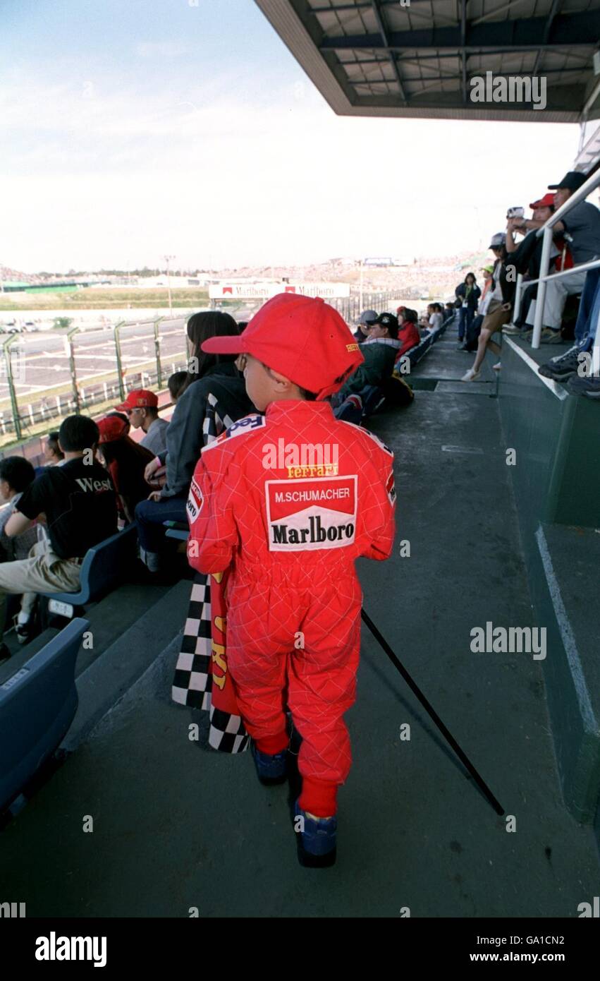 Formula One Motor Racing - Japanese Grand Prix - Race. A young Ferrari ...